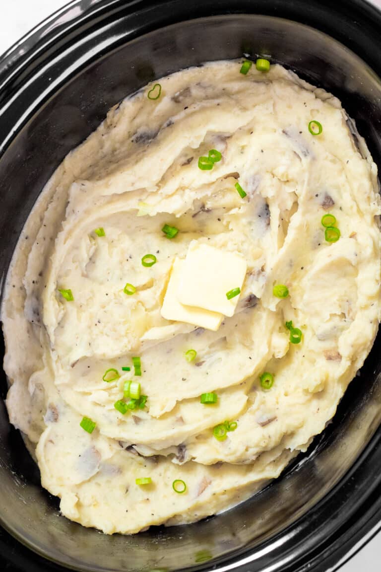 Slow Cooker Mashed Potatoes {No Boil, Easy Side} - The Gay Globetrotter
